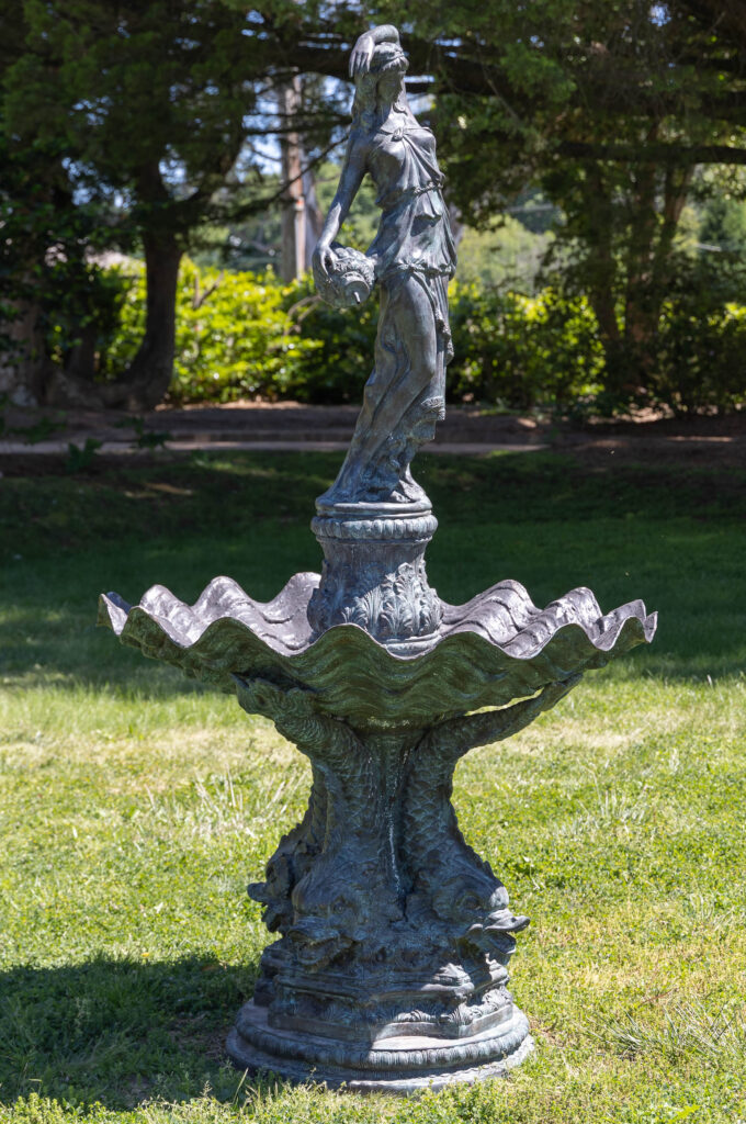 A large bronze fountain featuring a maiden with clam shell base. - The ...